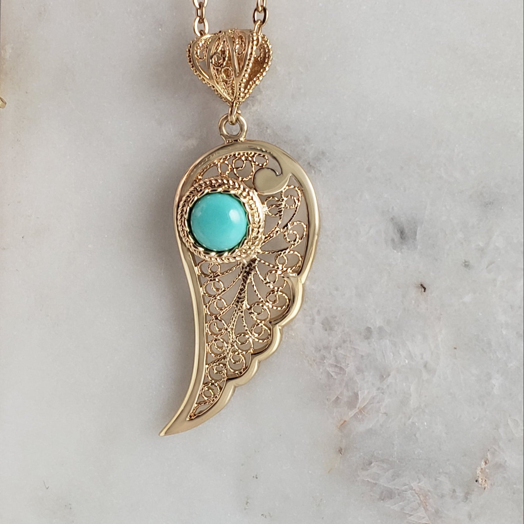 Filigree Angel Wing Pendant with Turquoise Stone